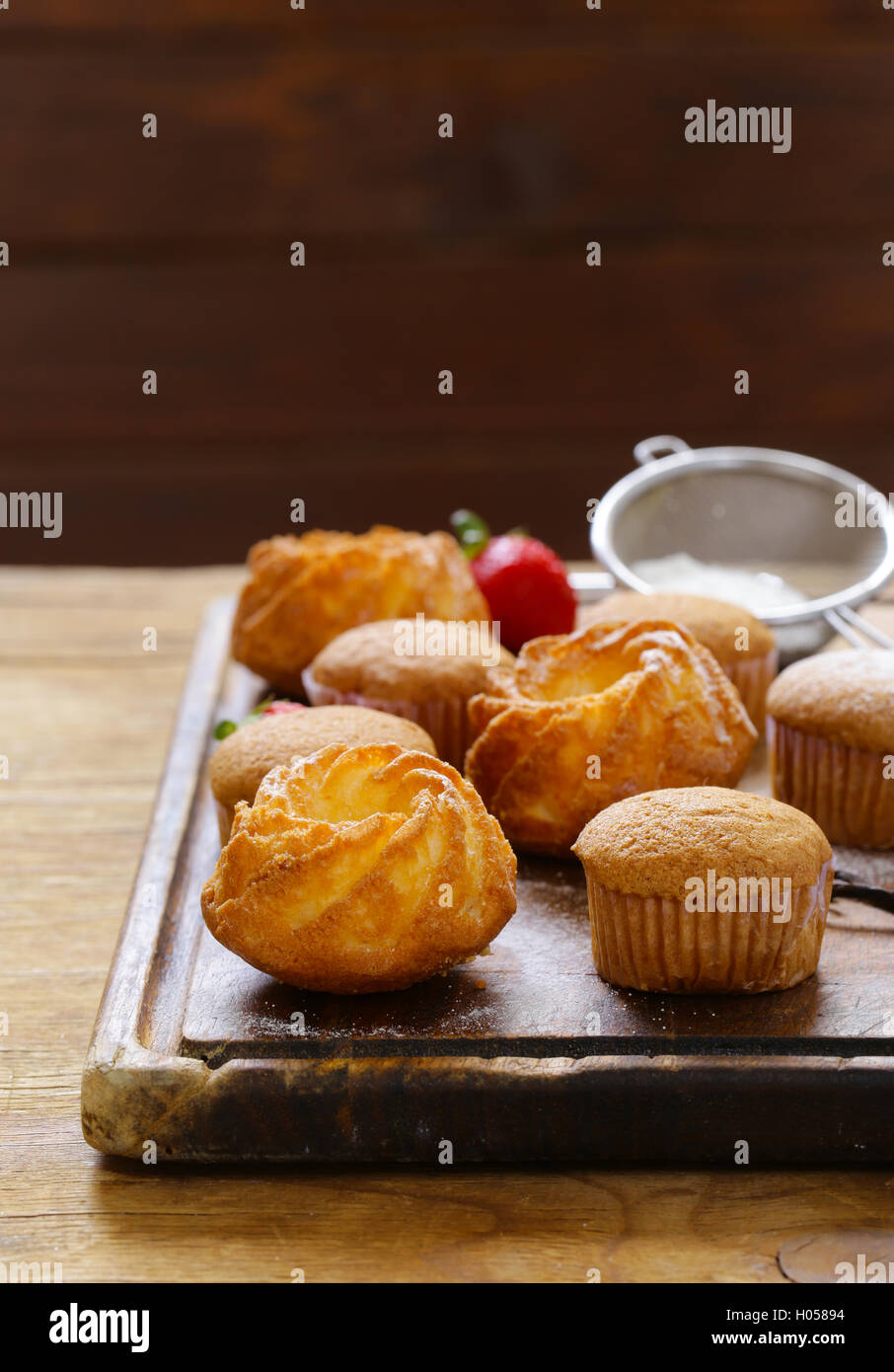 homemade pastries, sweet muffins with powdered sugar Stock Photo - Alamy