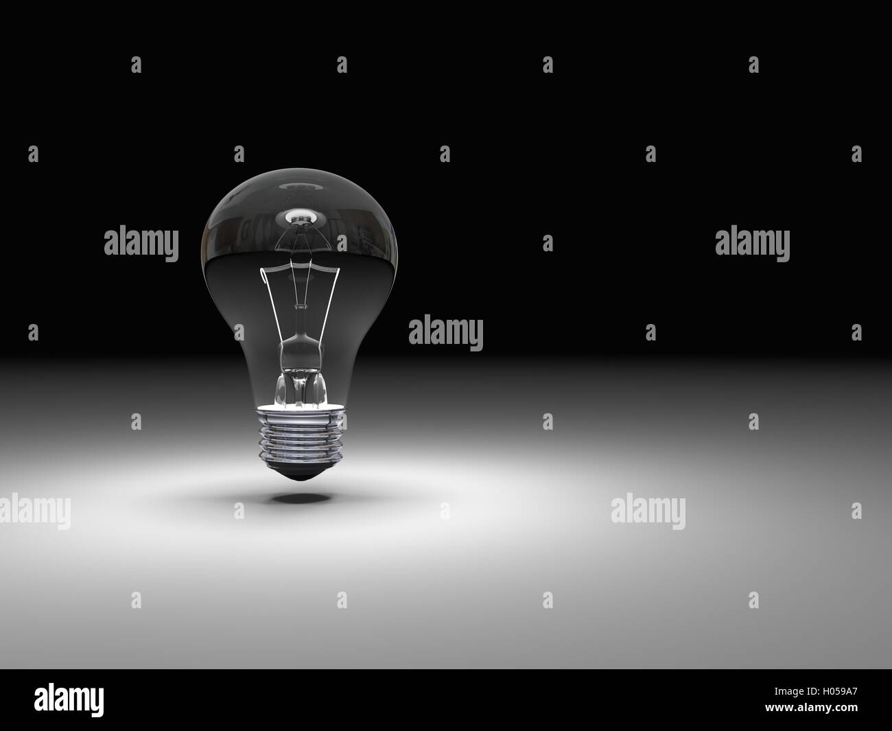 Lightbulb in dark Stock Photo - Alamy