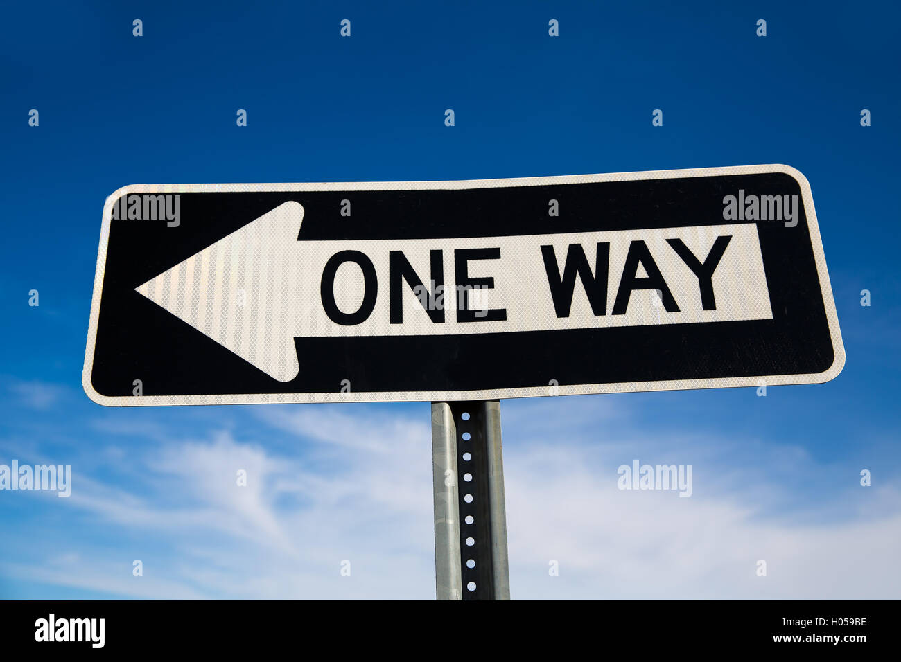 One way arrow sign in USA Stock Photo - Alamy