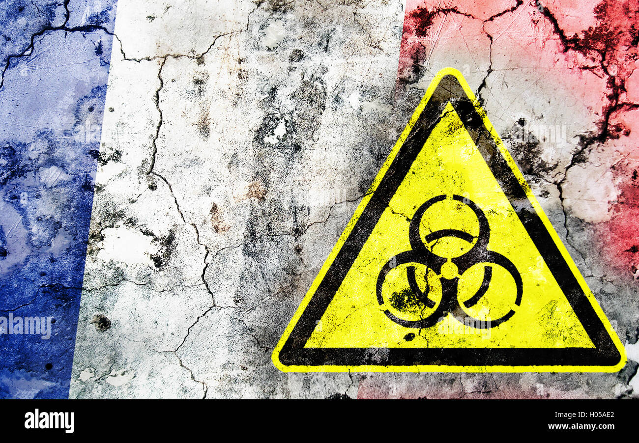 Old cracked wall with biohazard warning sign and painted flag Stock ...