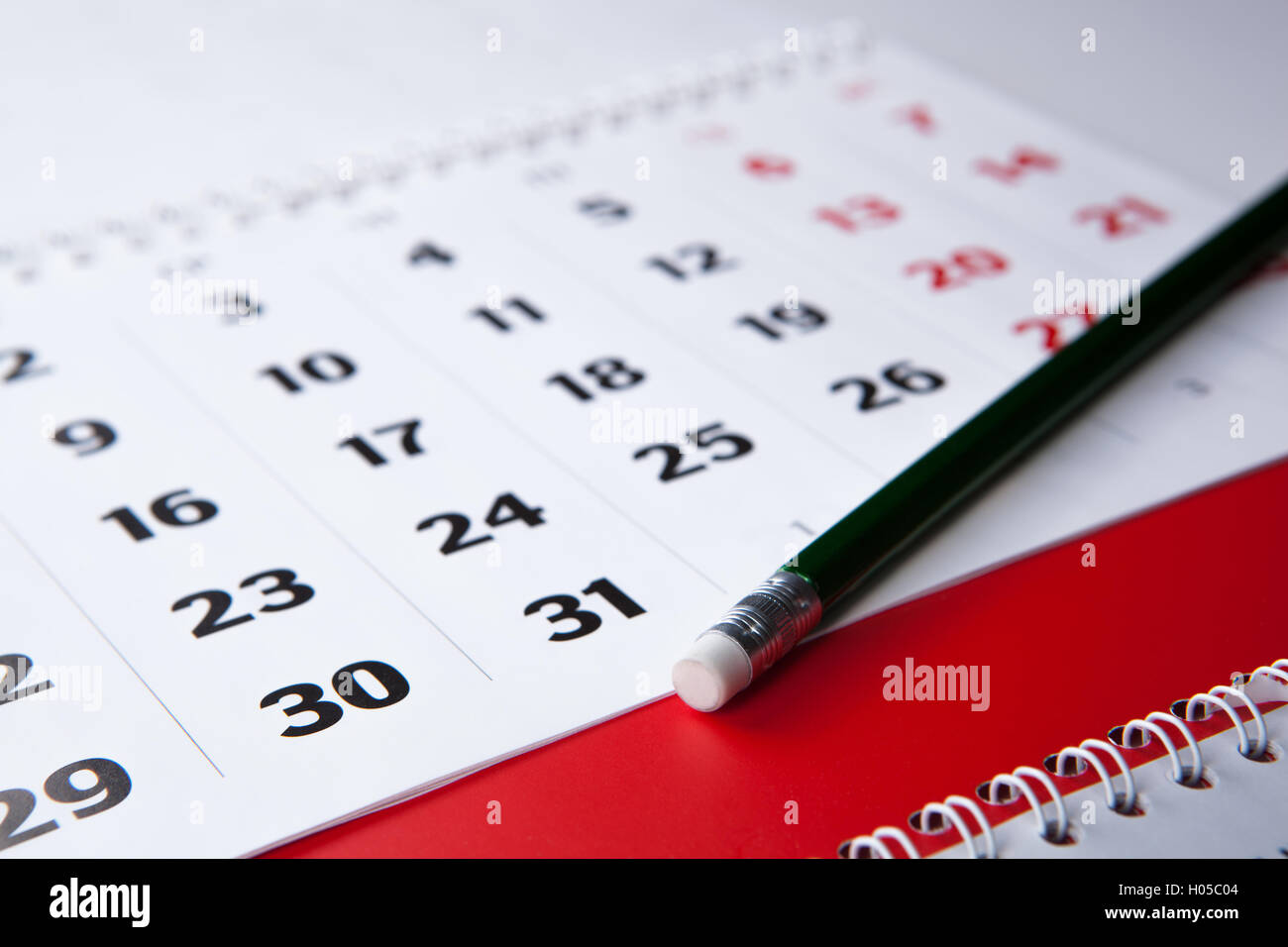 calendar and pencil close-up Stock Photo - Alamy