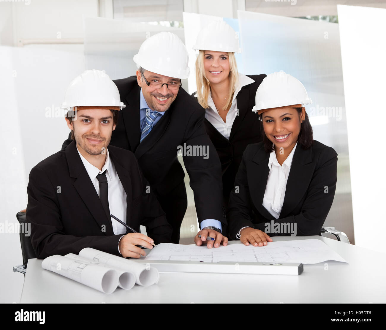 Group of architects at the meeting Stock Photo - Alamy
