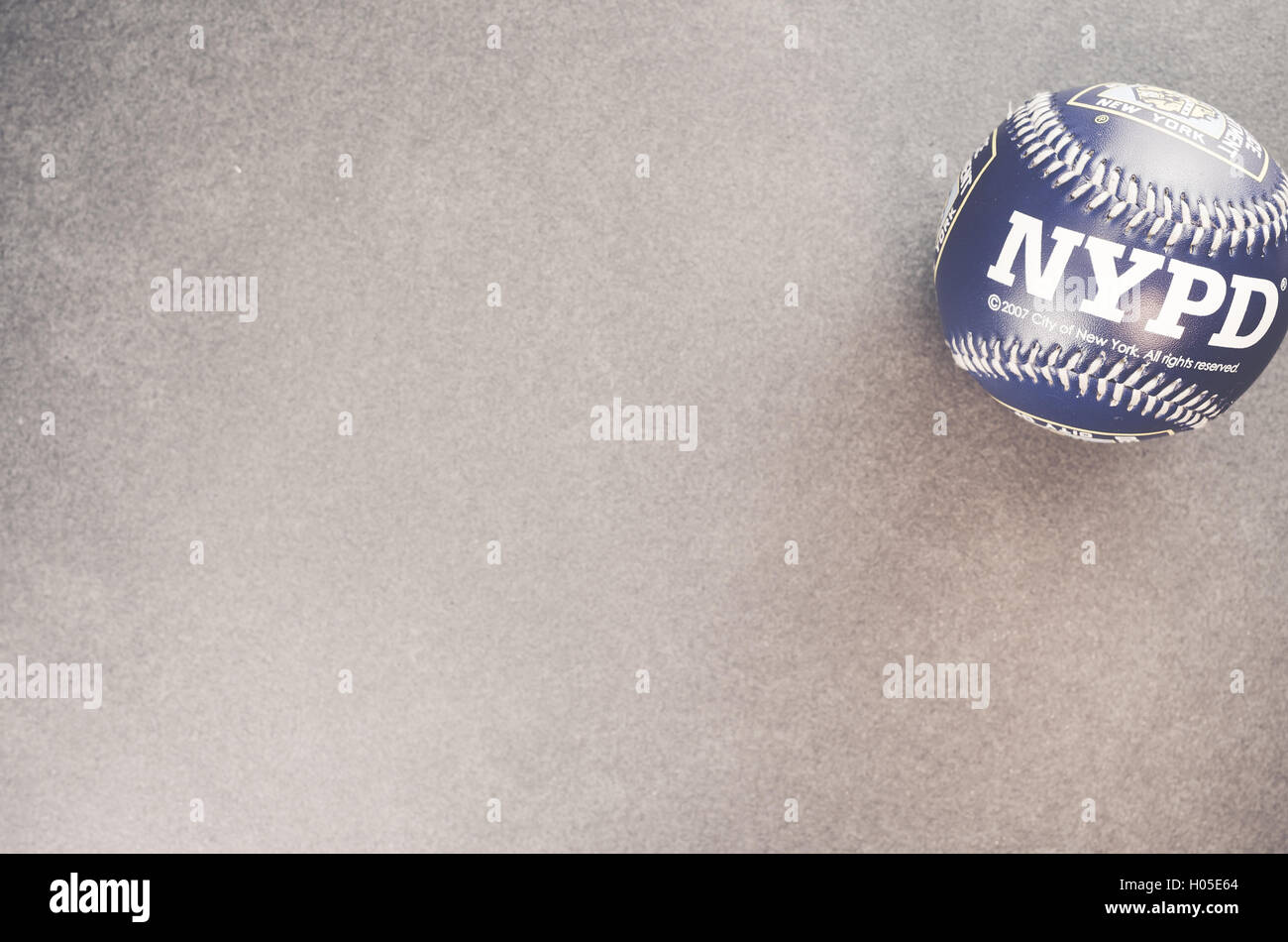NYPD blue baseball ball on a stone background - copy space Stock Photo ...
