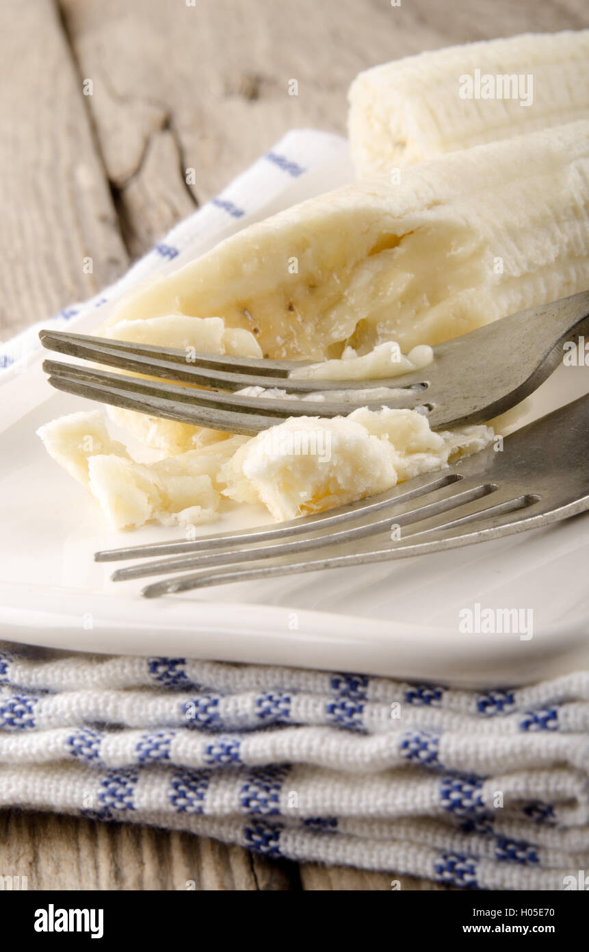 mashed banana on a plate Stock Photo - Alamy