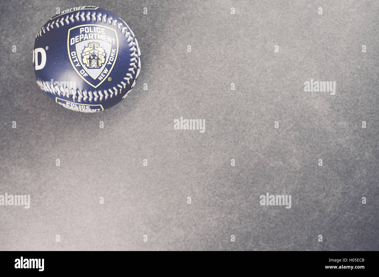 NYPD blue baseball ball on a stone background - copy space Stock Photo ...