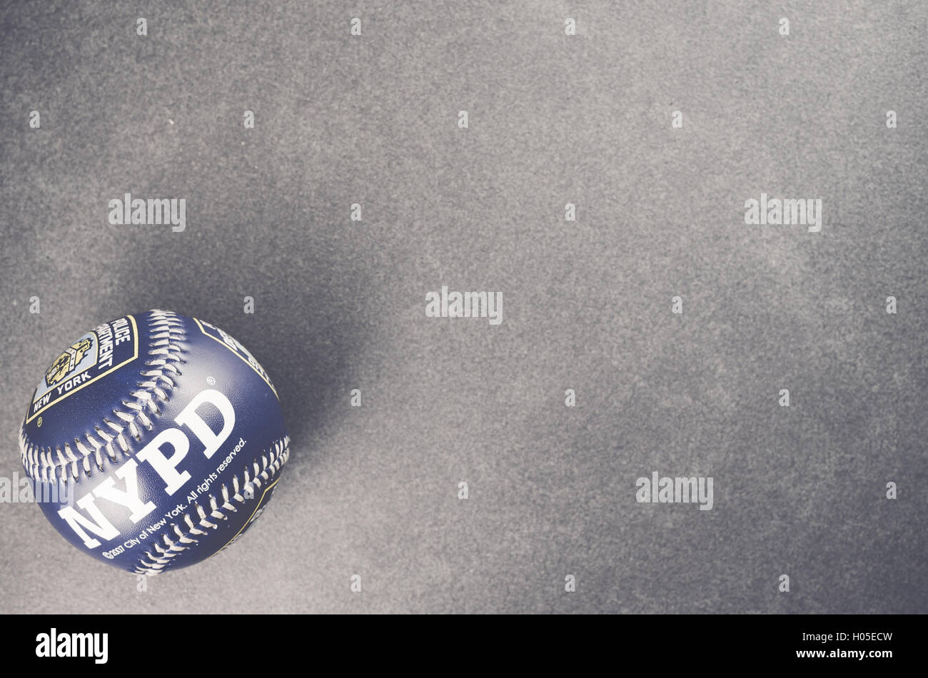 NYPD blue baseball ball on a stone background - copy space Stock Photo ...