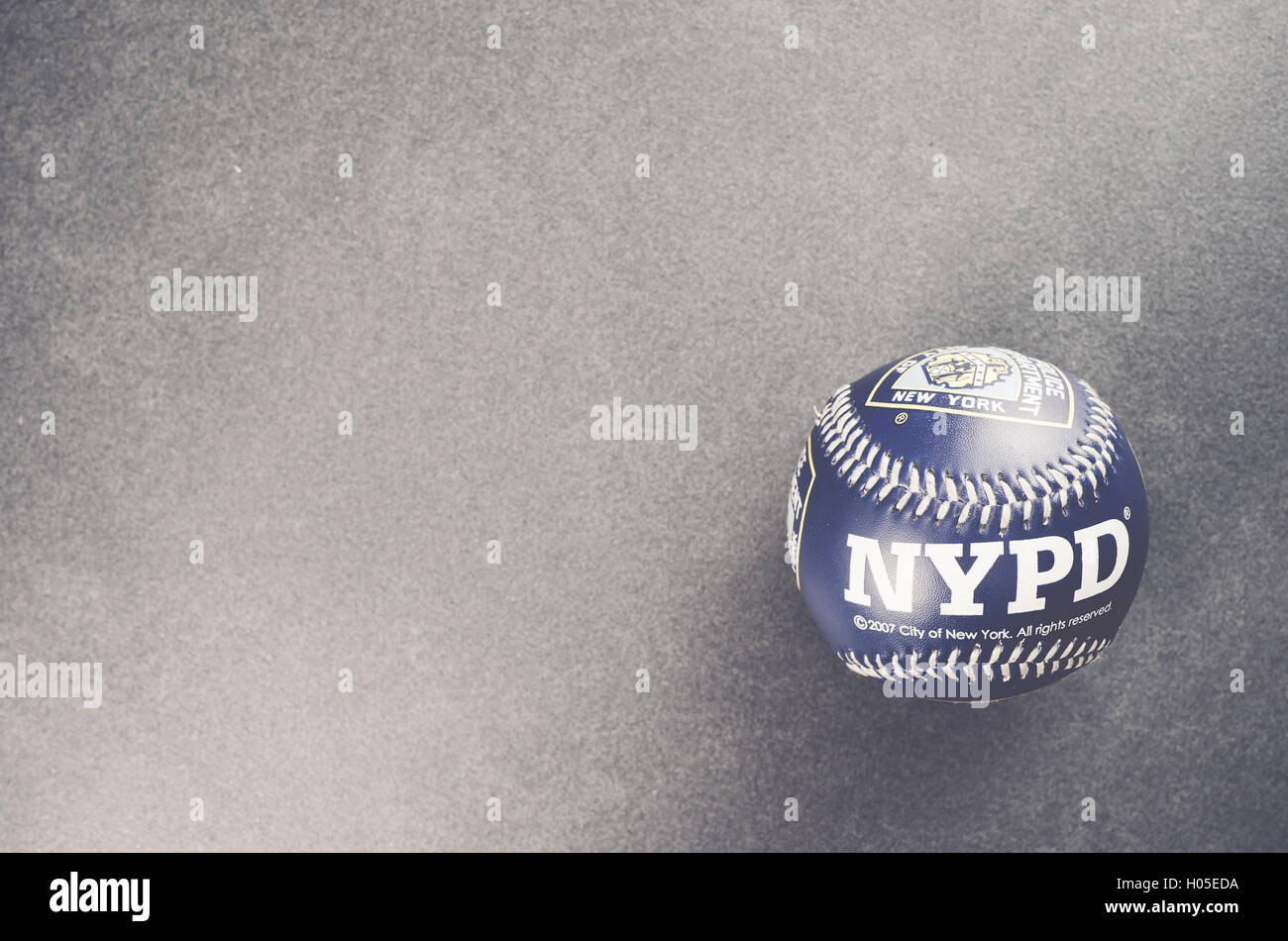 NYPD blue baseball ball on a stone background - copy space Stock Photo ...