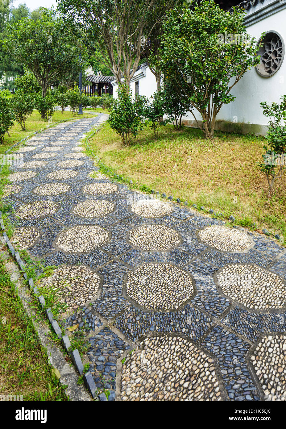 Pebble stone path in chinese garden Stock Photo - Alamy