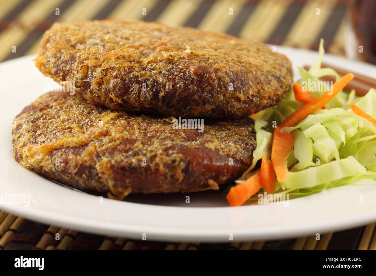 Cooked patties for Hamburger Stock Photo - Alamy