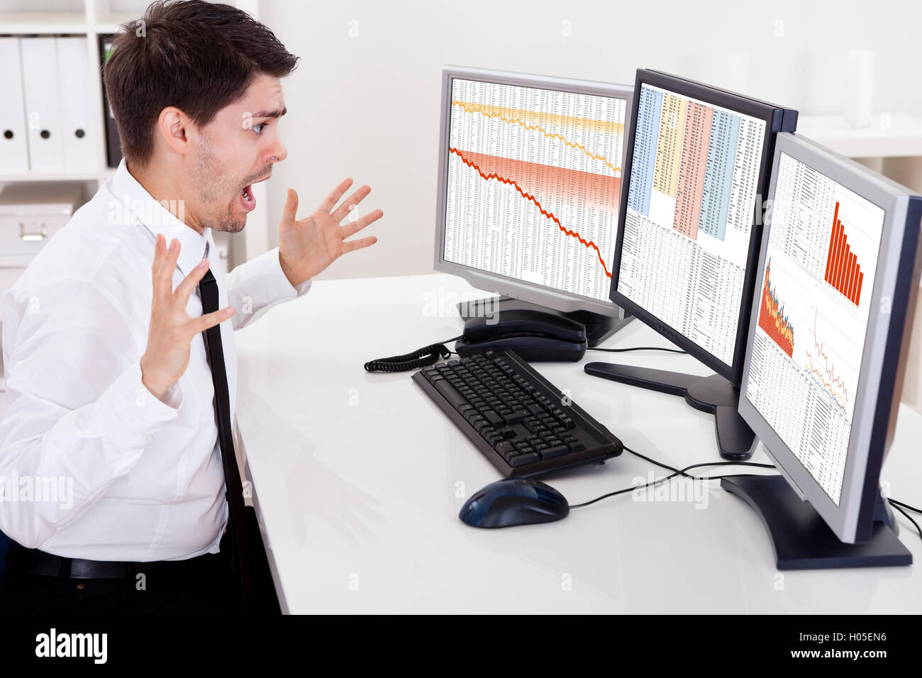 Worried stock broker Stock Photo - Alamy