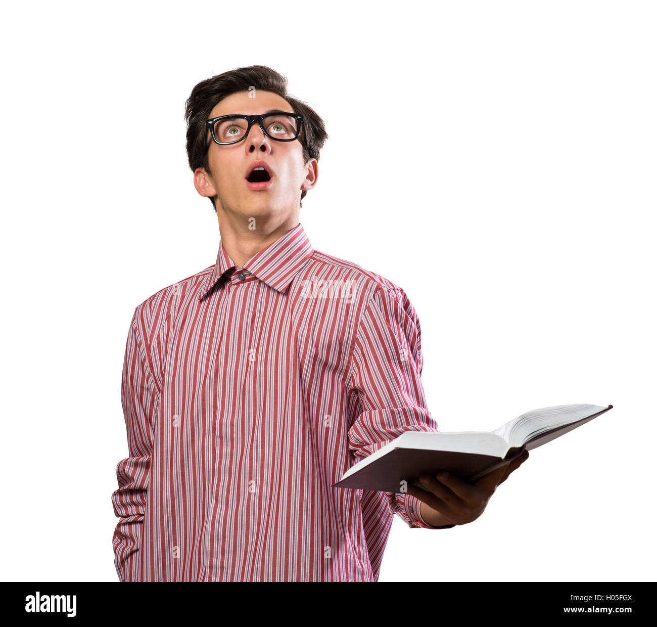 surprised man with a book Stock Photo - Alamy