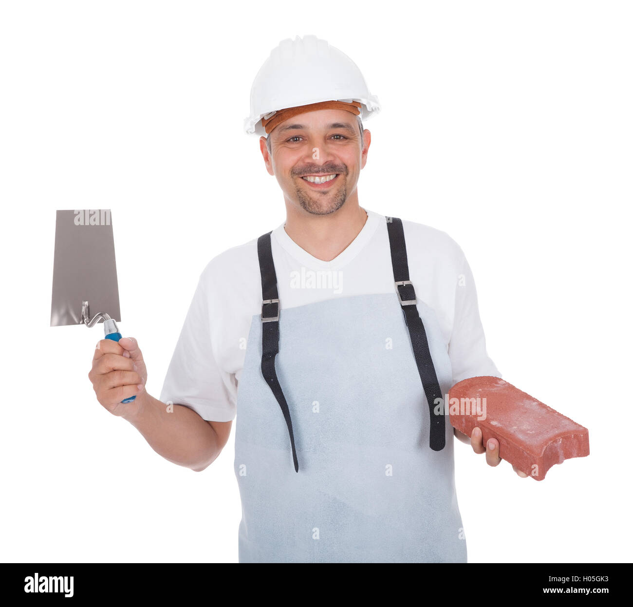 Portrait of smiling bricklayer Stock Photo - Alamy