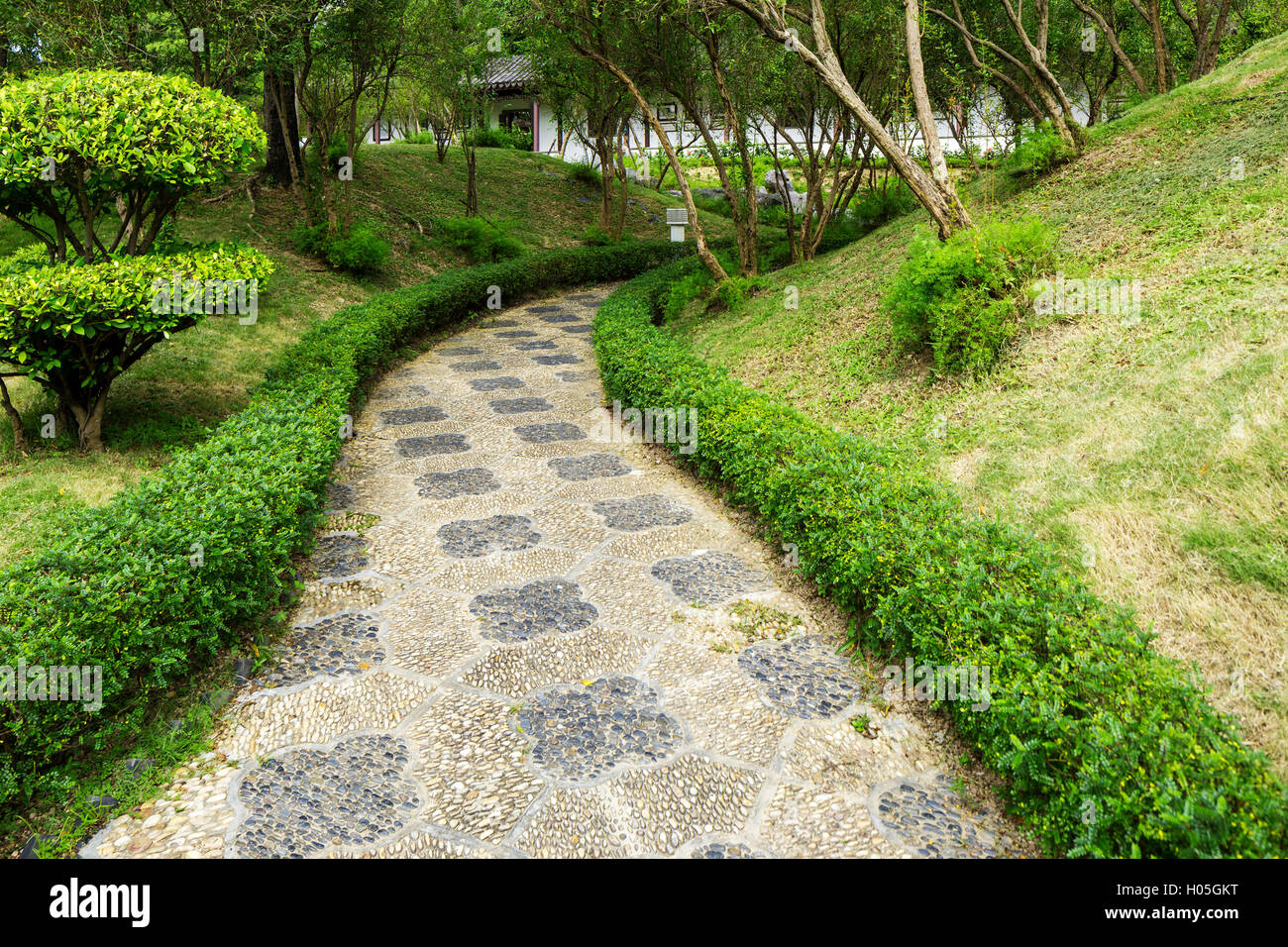 Stone path in chinese garden Stock Photo - Alamy