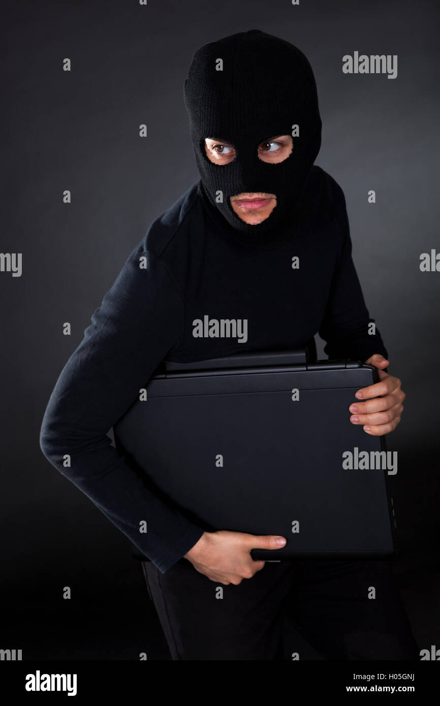 Burglar on Computer Stock Photo - Alamy
