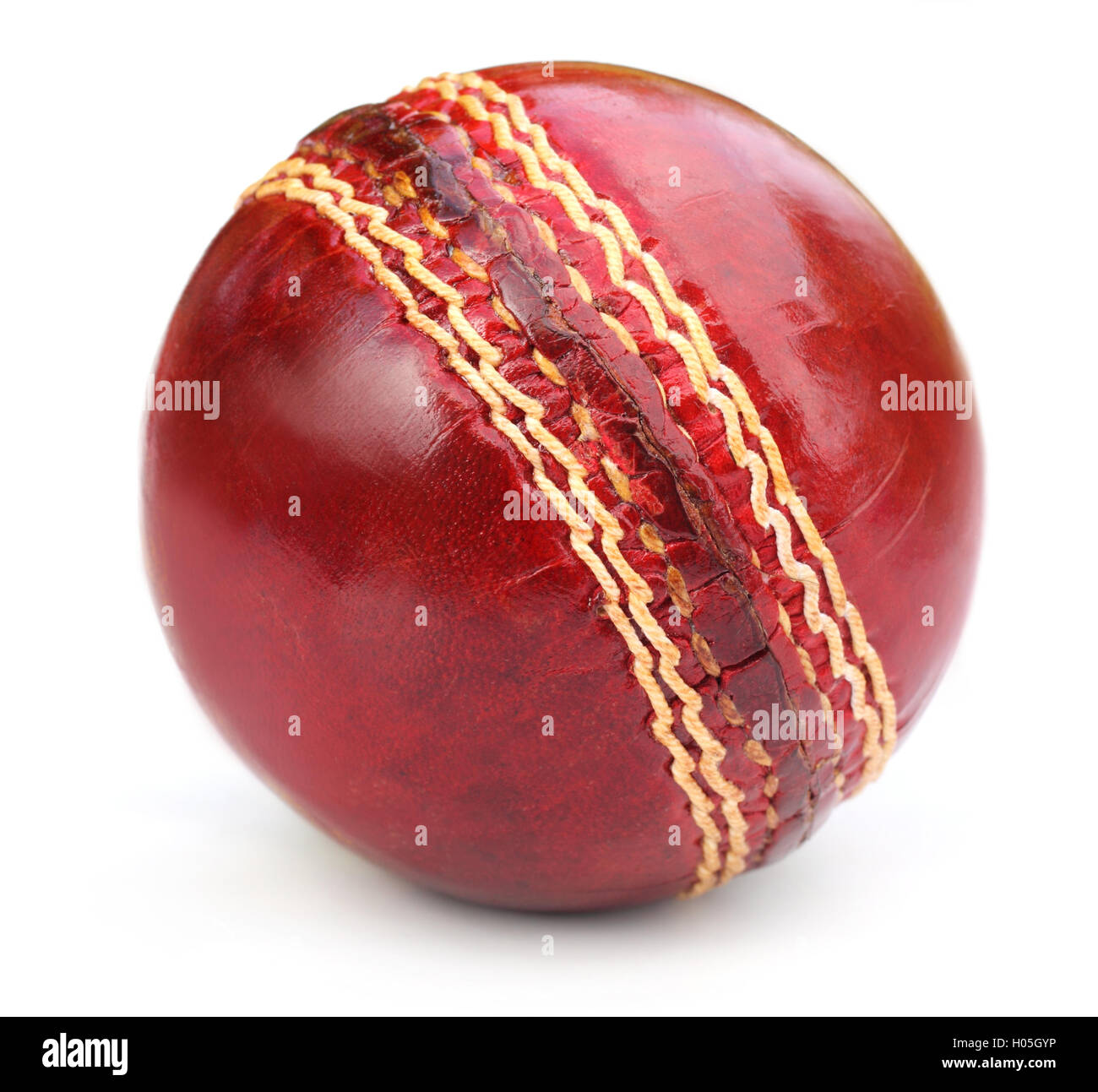 Macro of a cricket ball seam Stock Photo - Alamy