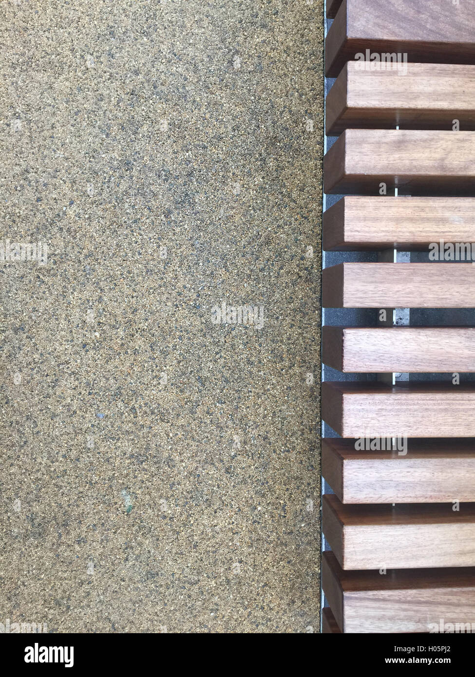 wooden bench looking down from above showing concrete path Stock Photo ...