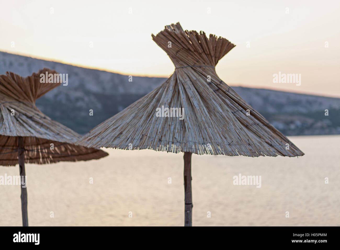 Reed beach umbrella hi-res stock photography and images - Alamy