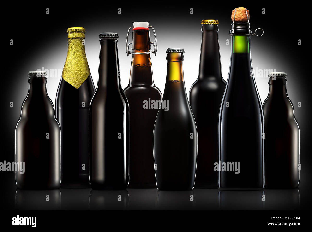 Set of beer bottles isolated on black background Stock Photo - Alamy