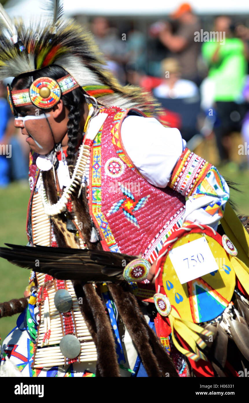 American Indians take part in a Grand Entry ceremony during Saturday’s ...