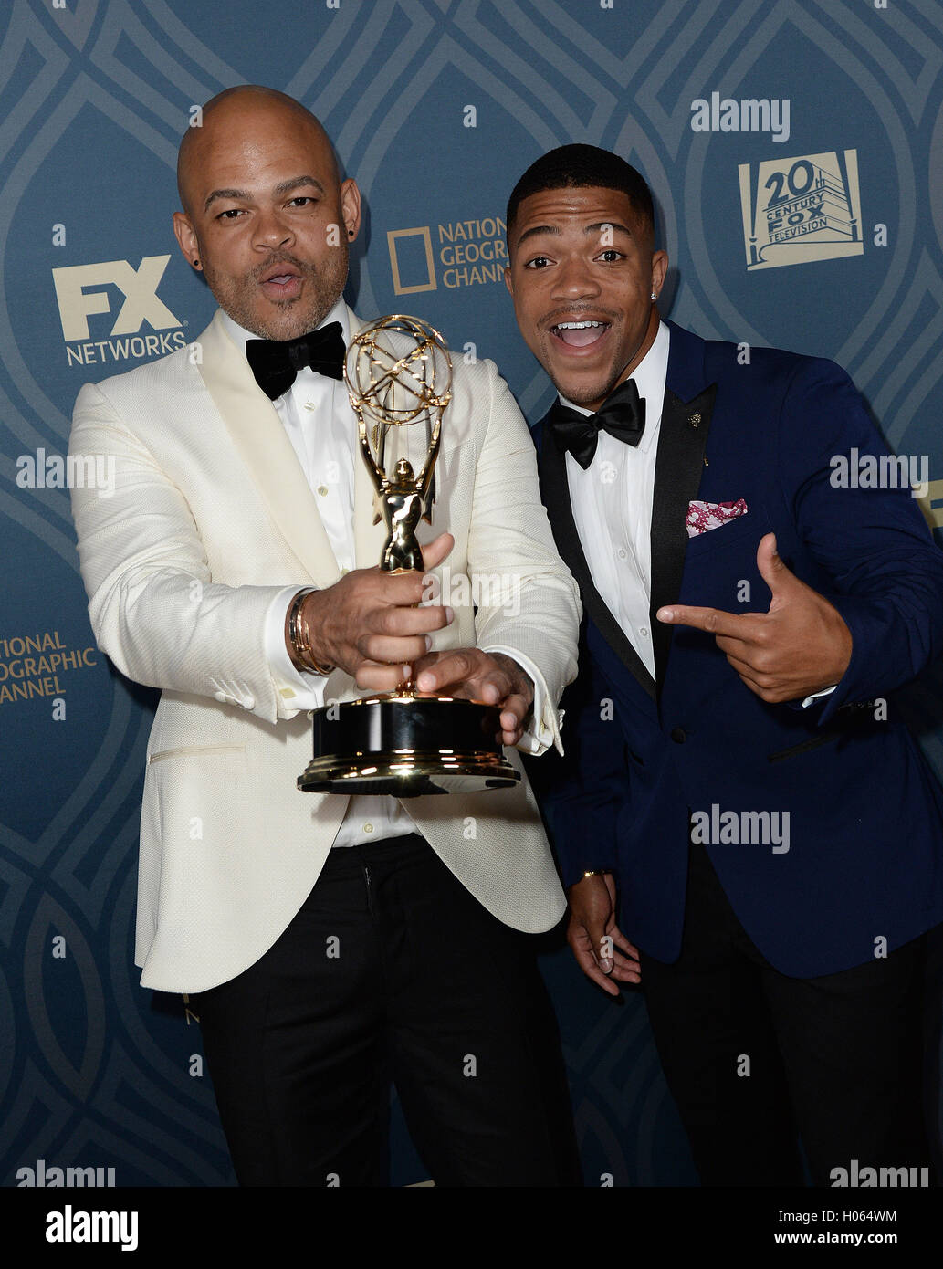 LOS ANGELES, CA - SEPTEMBER 18: Director Anthony Hemingway (L) and ...