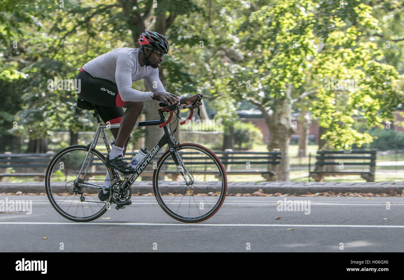 A man is riding a bicycle in Central Park Stock Photo - Alamy