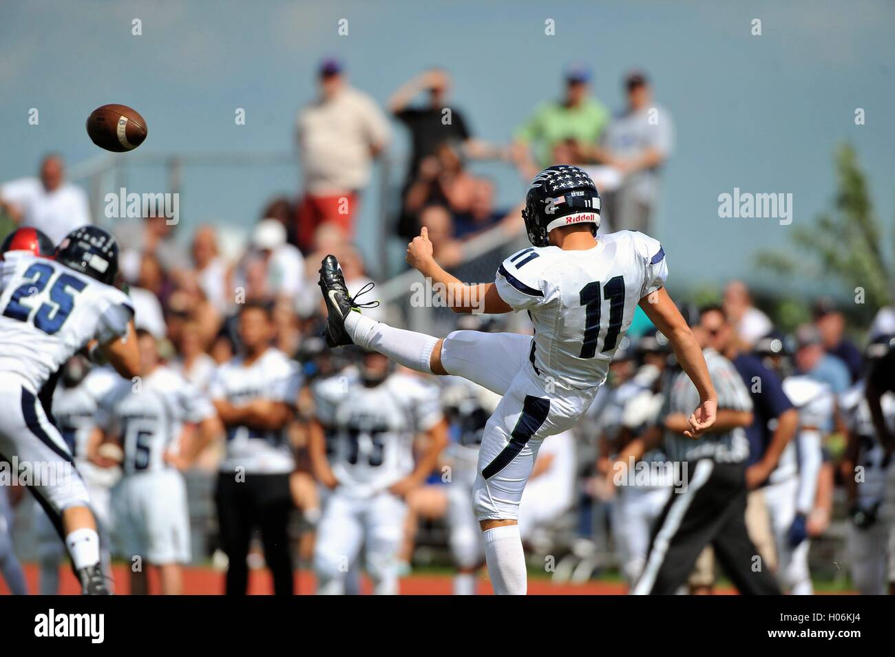 Punter getting off a successful kick without being pressured during a ...