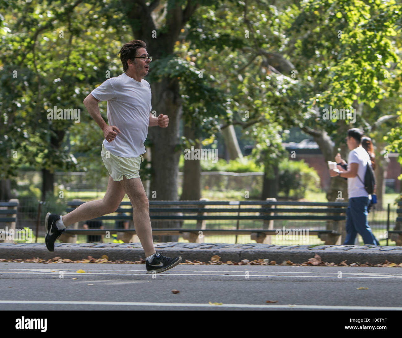 A man is running in Central Park Stock Photo - Alamy