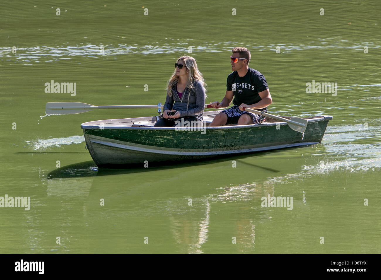 Romantic couple in row boat hi-res stock photography and images - Alamy