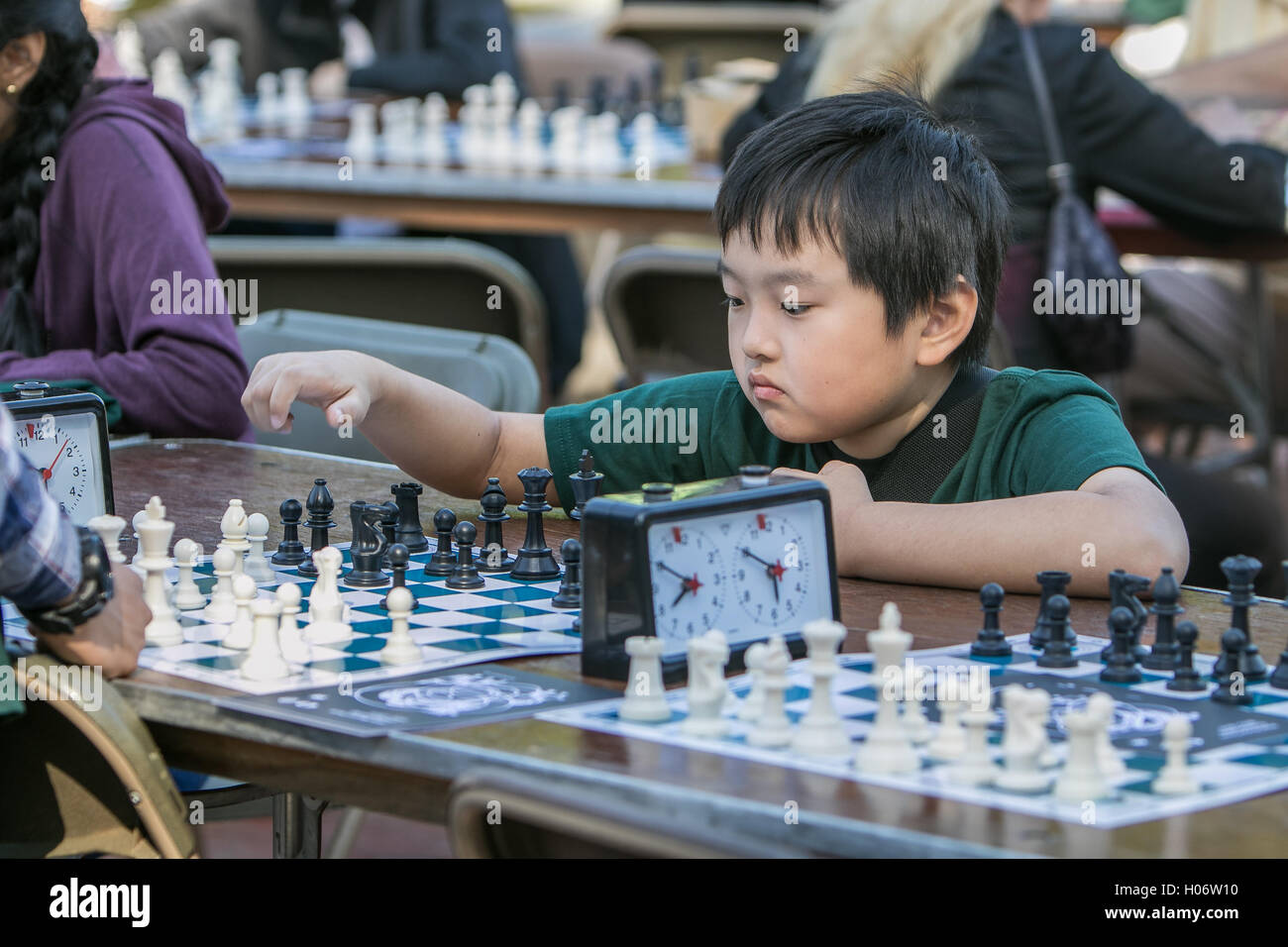 A kid is playing chess Stock Photo - Alamy
