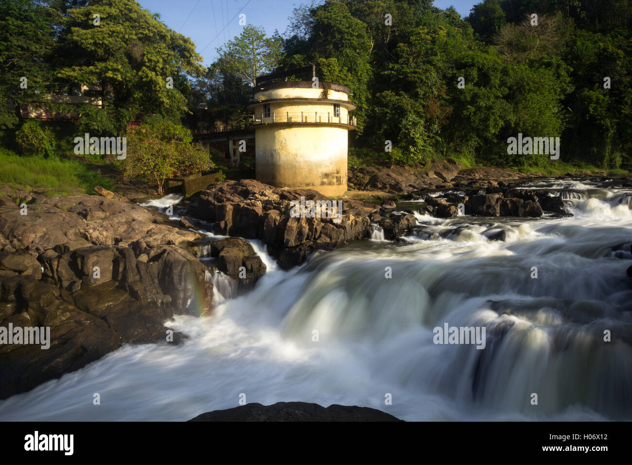 Morning hues at Perunthenaruvi waterfalls on the banks of the Pamba ...