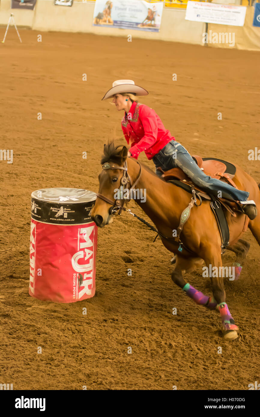 A Cowgirl Barrel Racing at an Indoor Arena, Tamworth Australia Stock ...