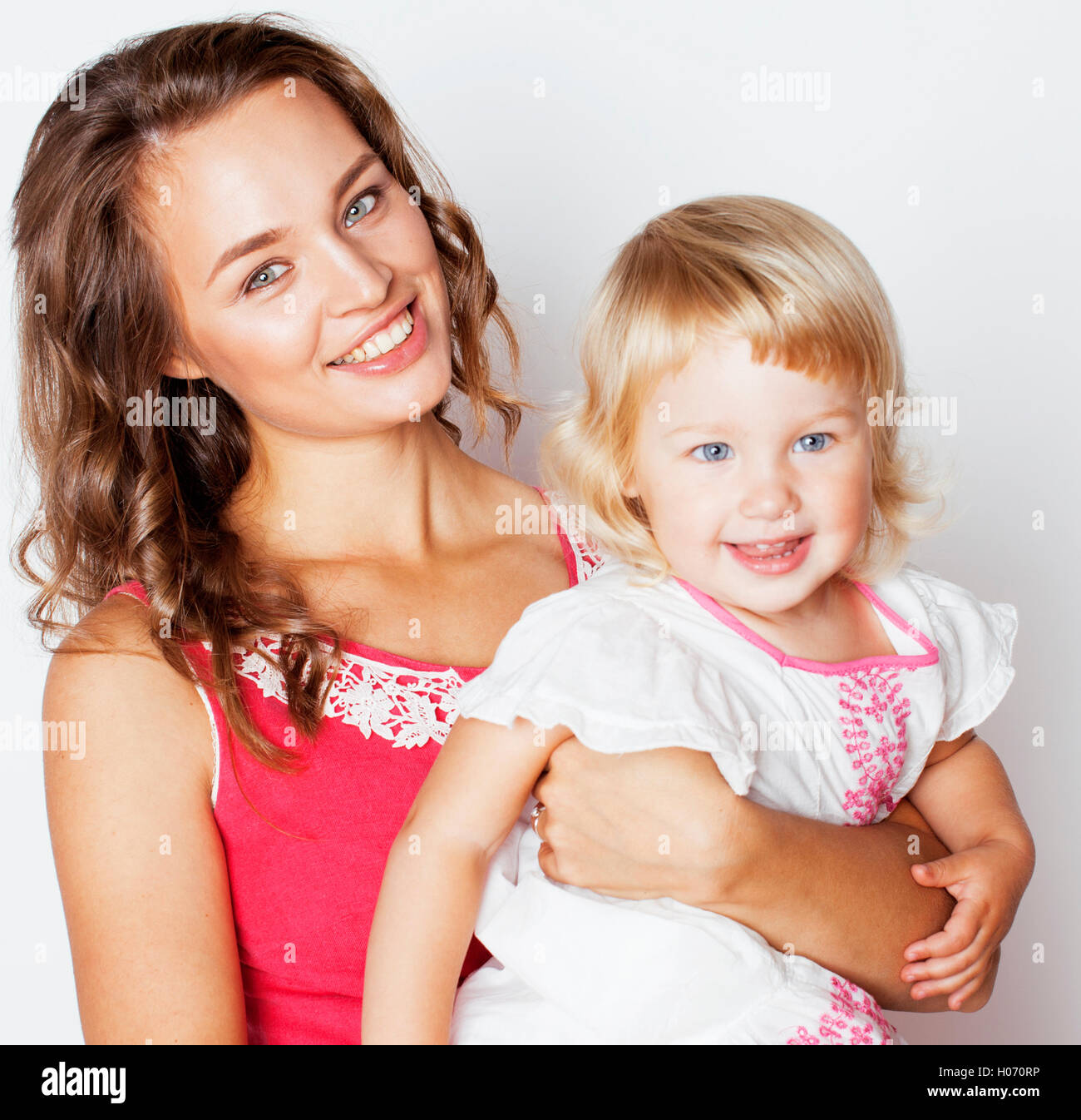 Young Pretty Stylish Mother With Little Cute Blond Daughter Hugging 0239