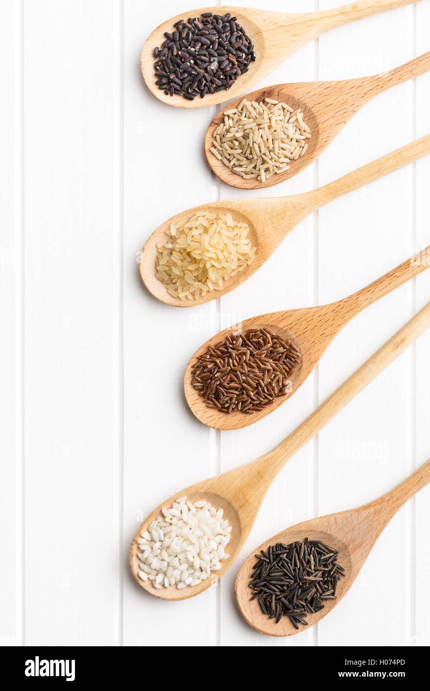 Different rice varieties on kitchen table. Top view Stock Photo - Alamy