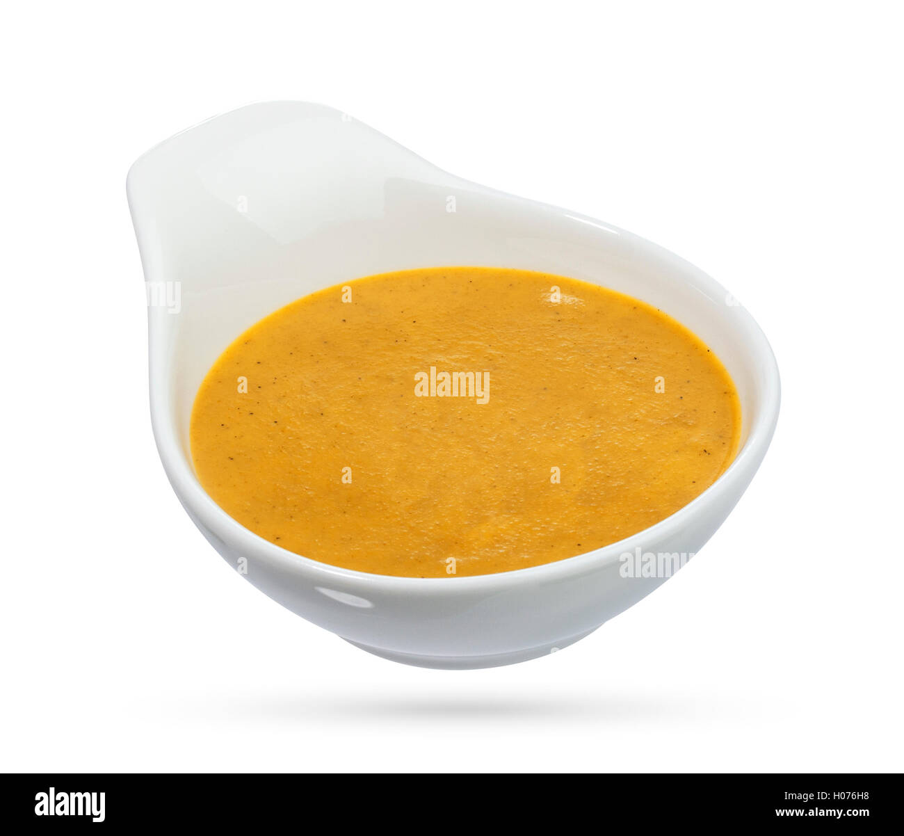 Bowl of mustard on white background. With clipping path Stock Photo - Alamy