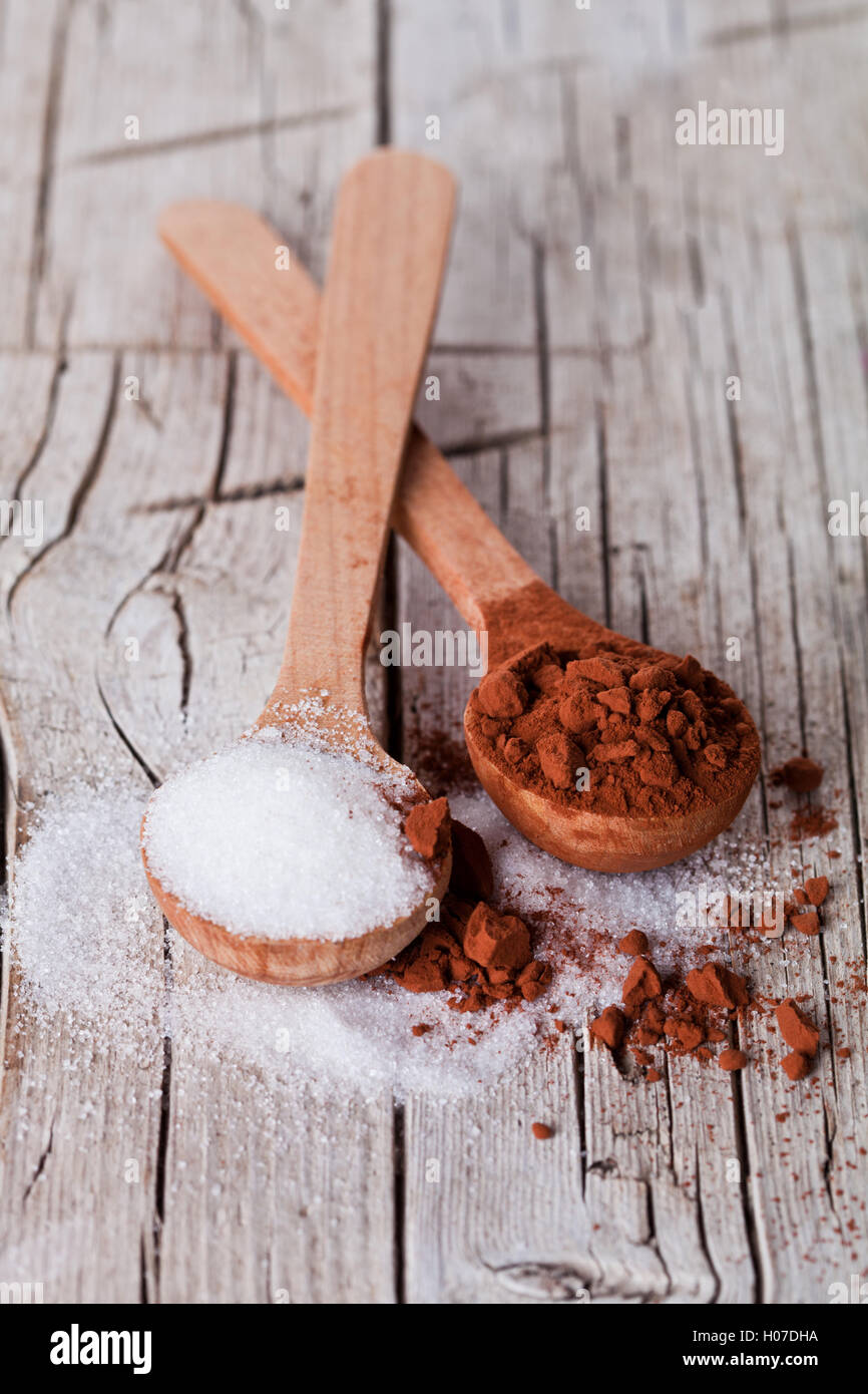 sugar and cocoa powder in spoons Stock Photo - Alamy
