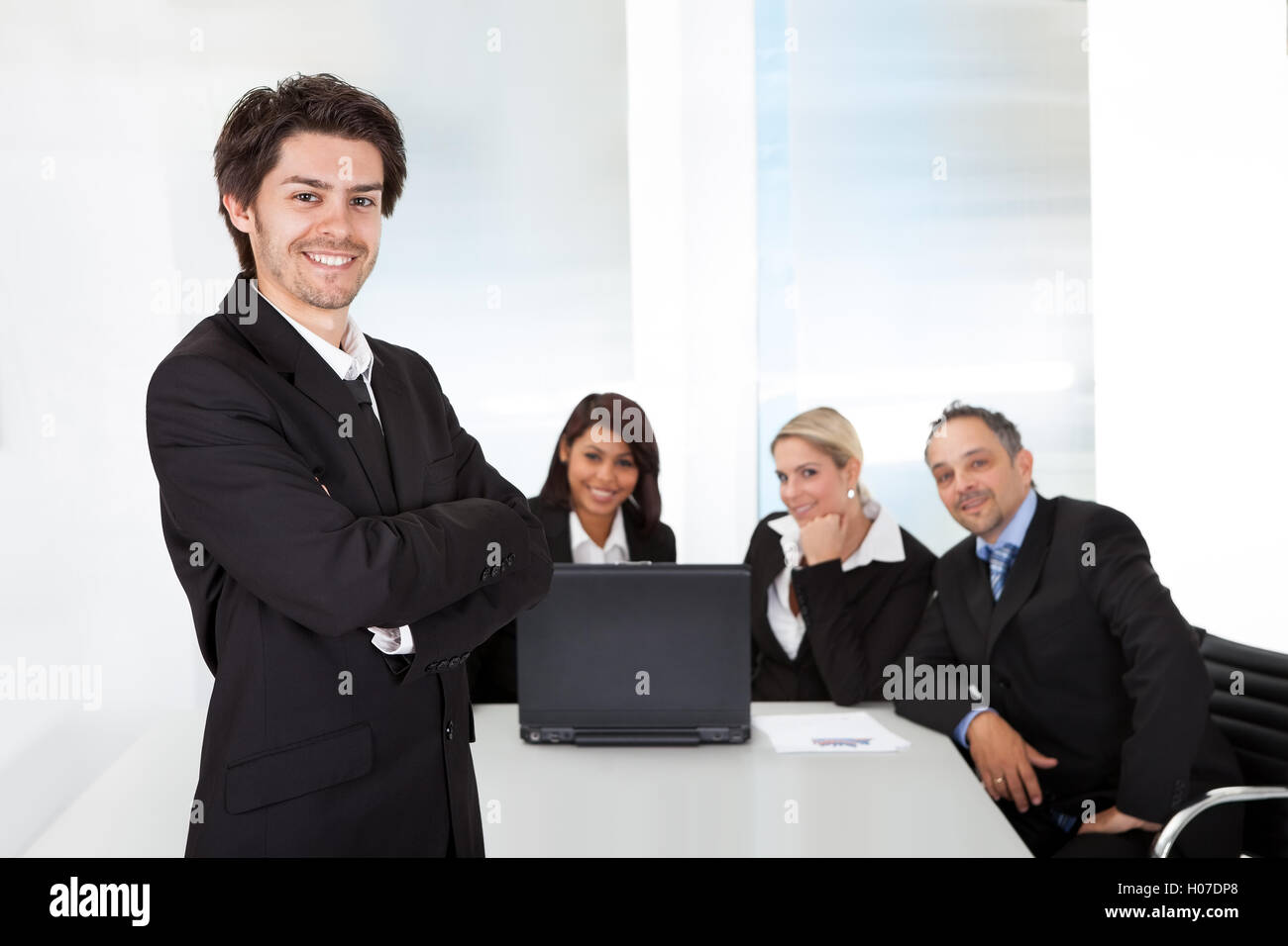 Business man and his team Stock Photo - Alamy