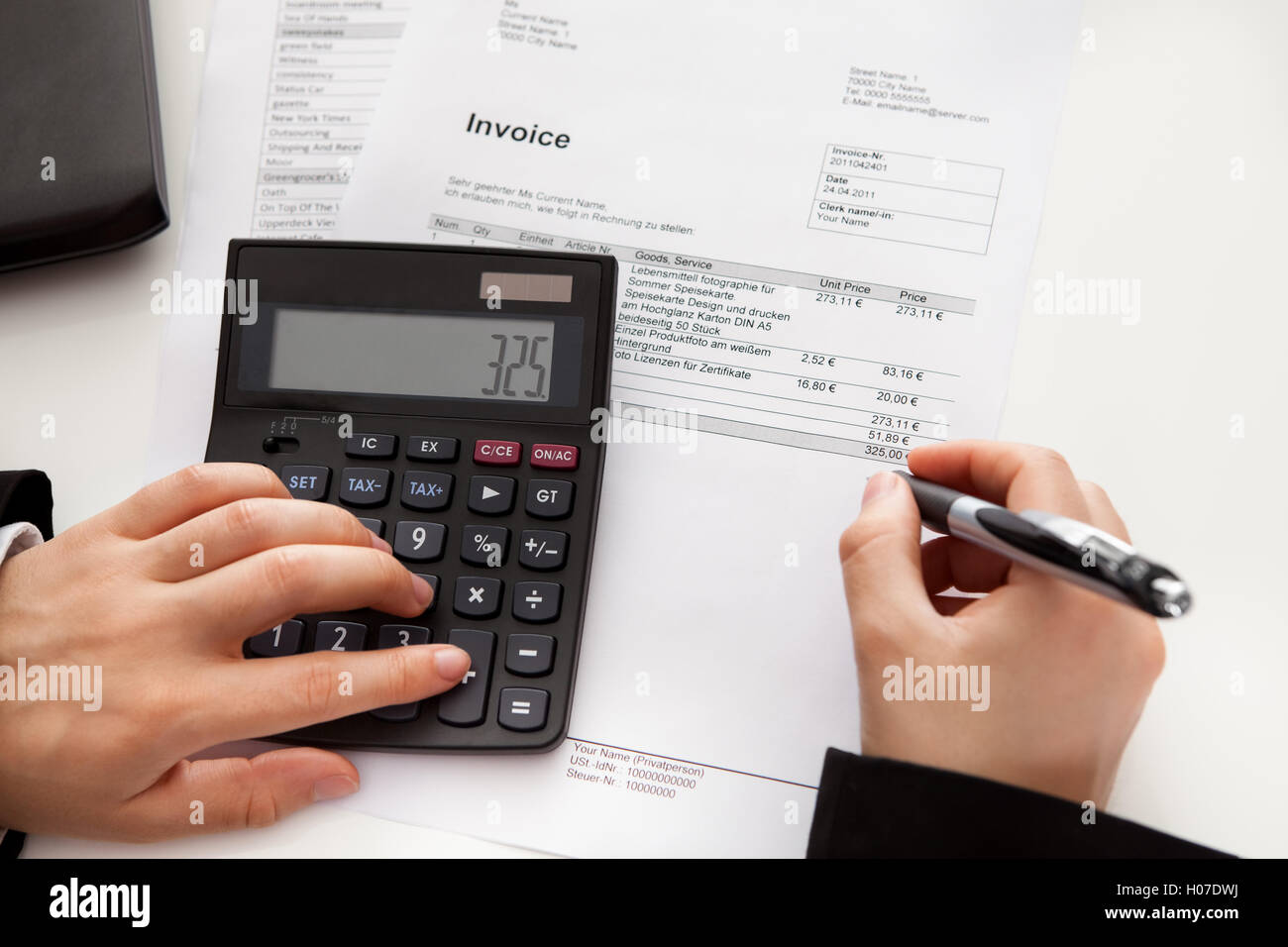 Accountant doing calculations Stock Photo - Alamy