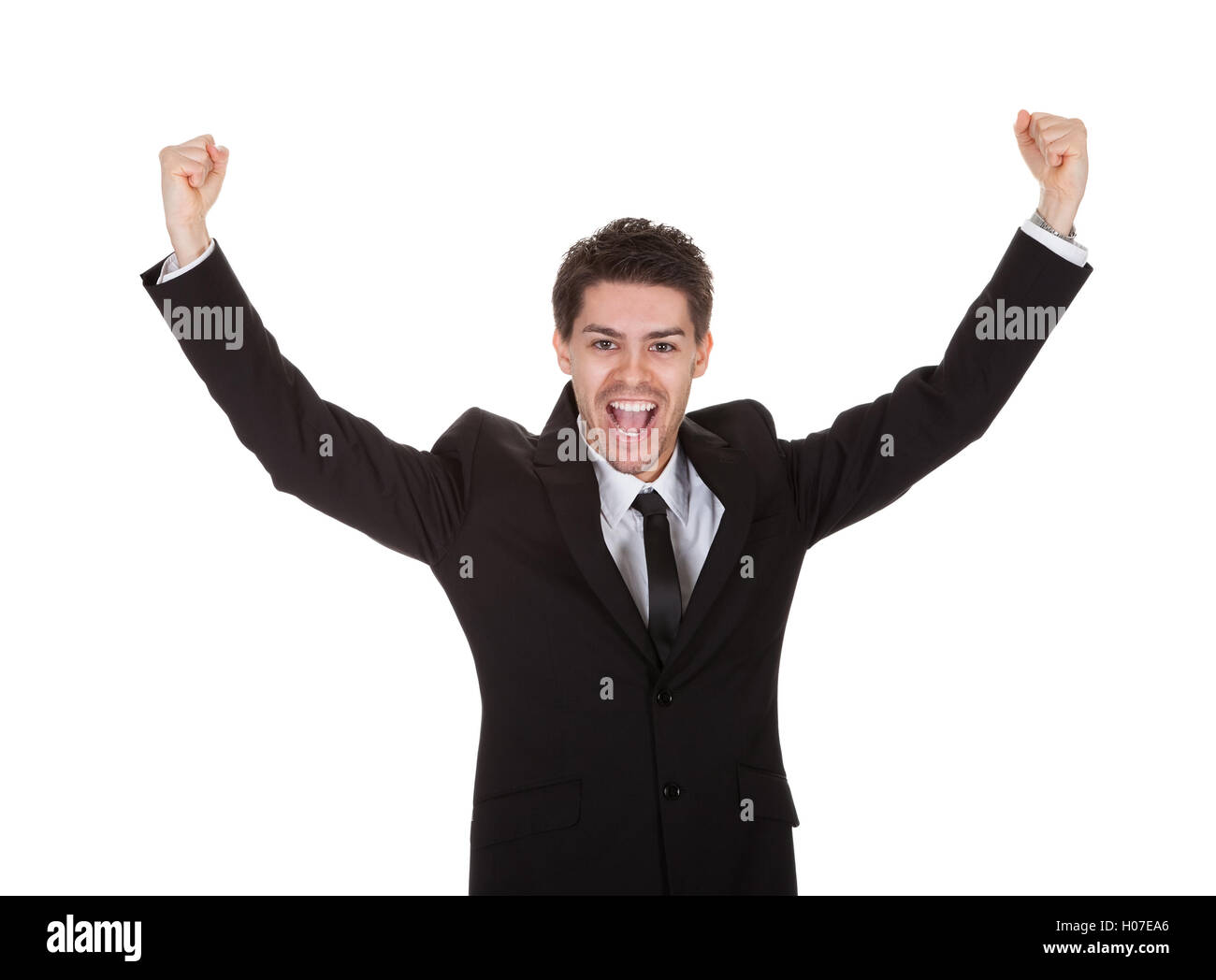 Portrait of excited businessman Stock Photo - Alamy