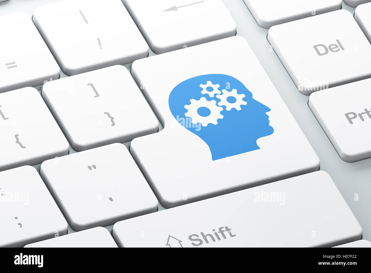 Education concept: Head With Gears on computer keyboard background ...