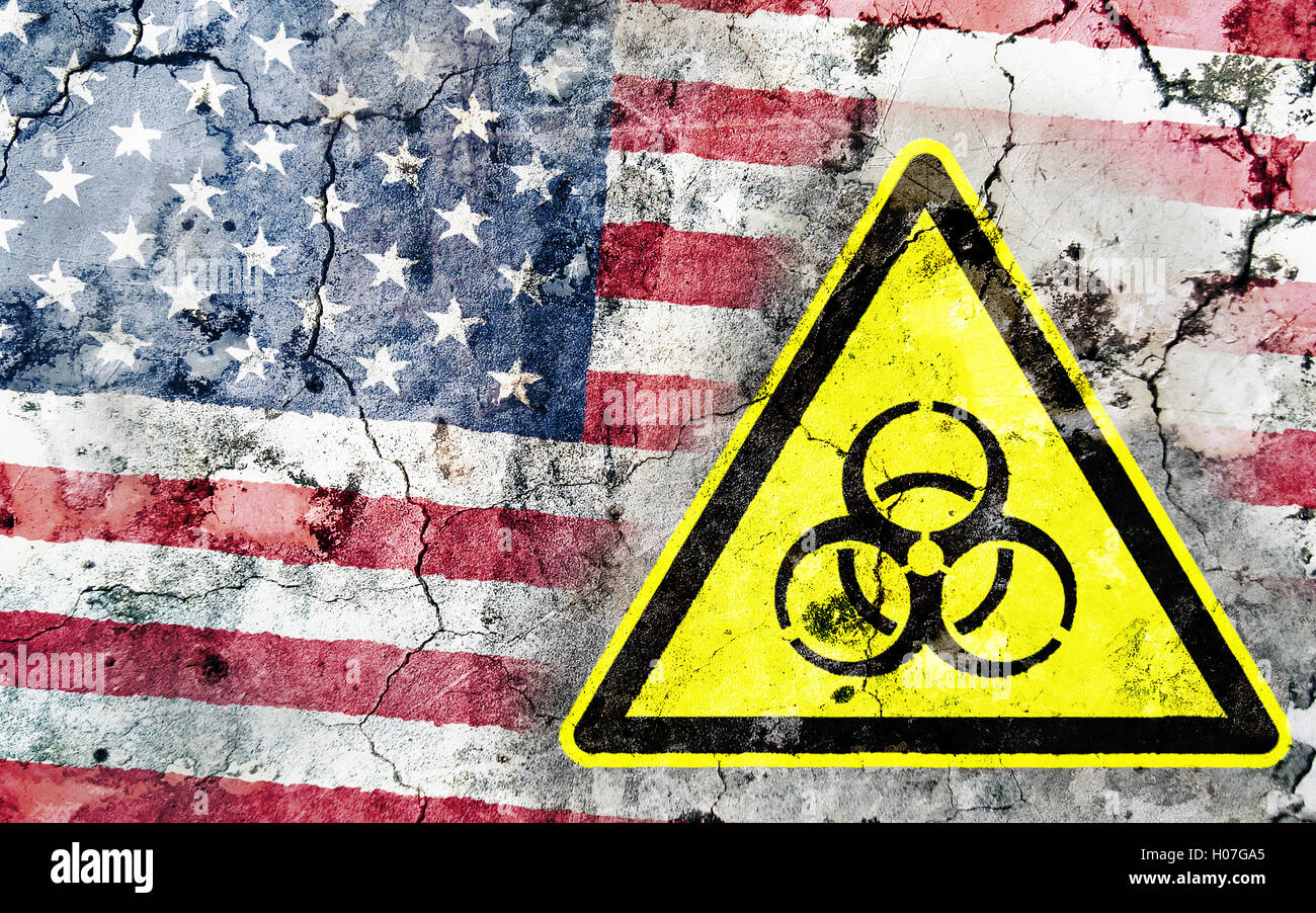 Old cracked wall with biohazard warning sign and painted flag Stock ...