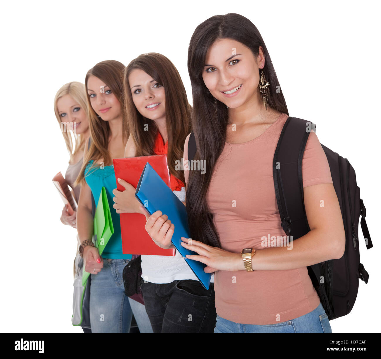 Four female students in a row Stock Photo - Alamy