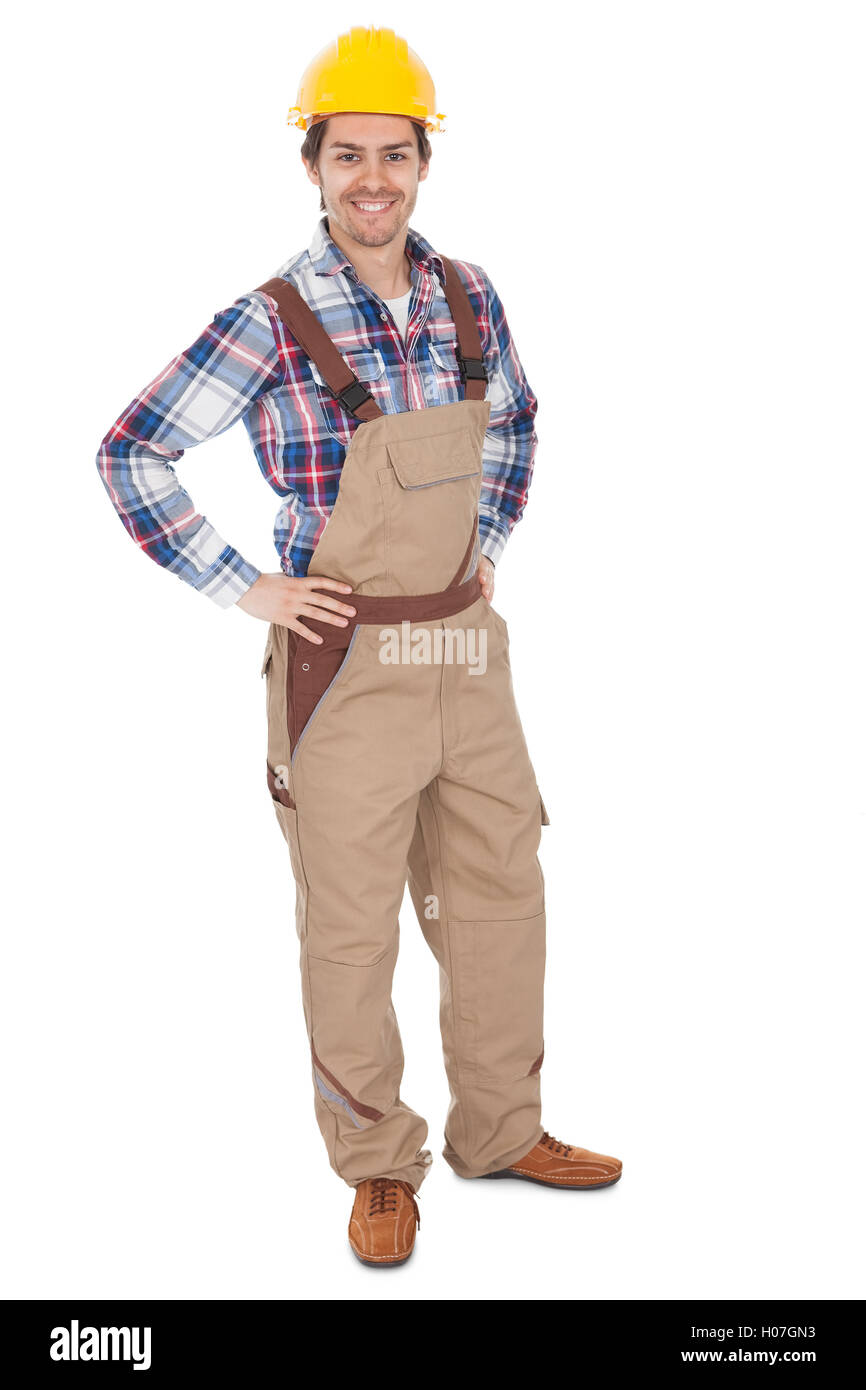 Confident worker wearing hard hat Stock Photo - Alamy