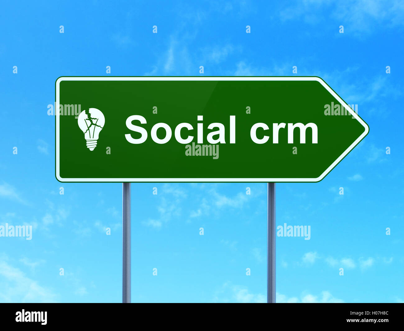 Business concept: Social CRM and Light Bulb on road sign background ...