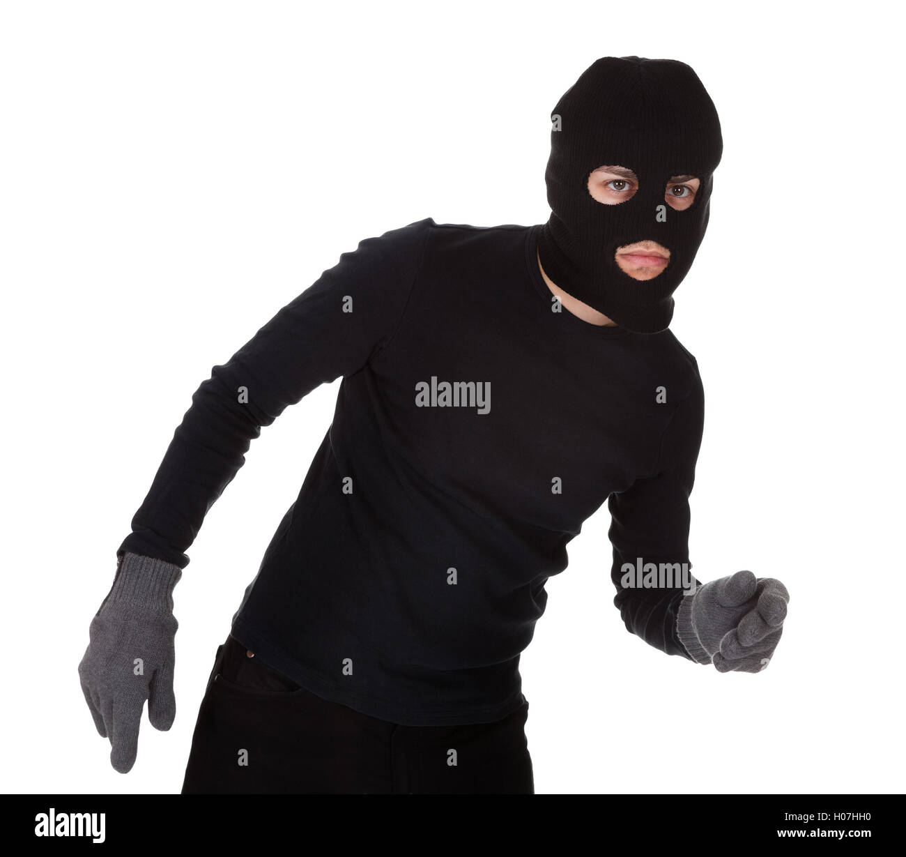 Thief wearing a balaclava Stock Photo - Alamy