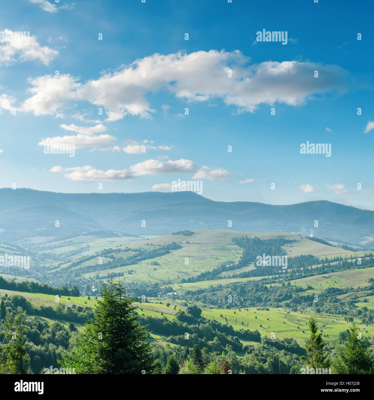 aerial view to green mountain Stock Photo - Alamy