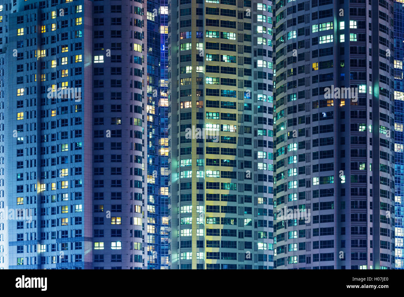 Modern office building at night Stock Photo - Alamy