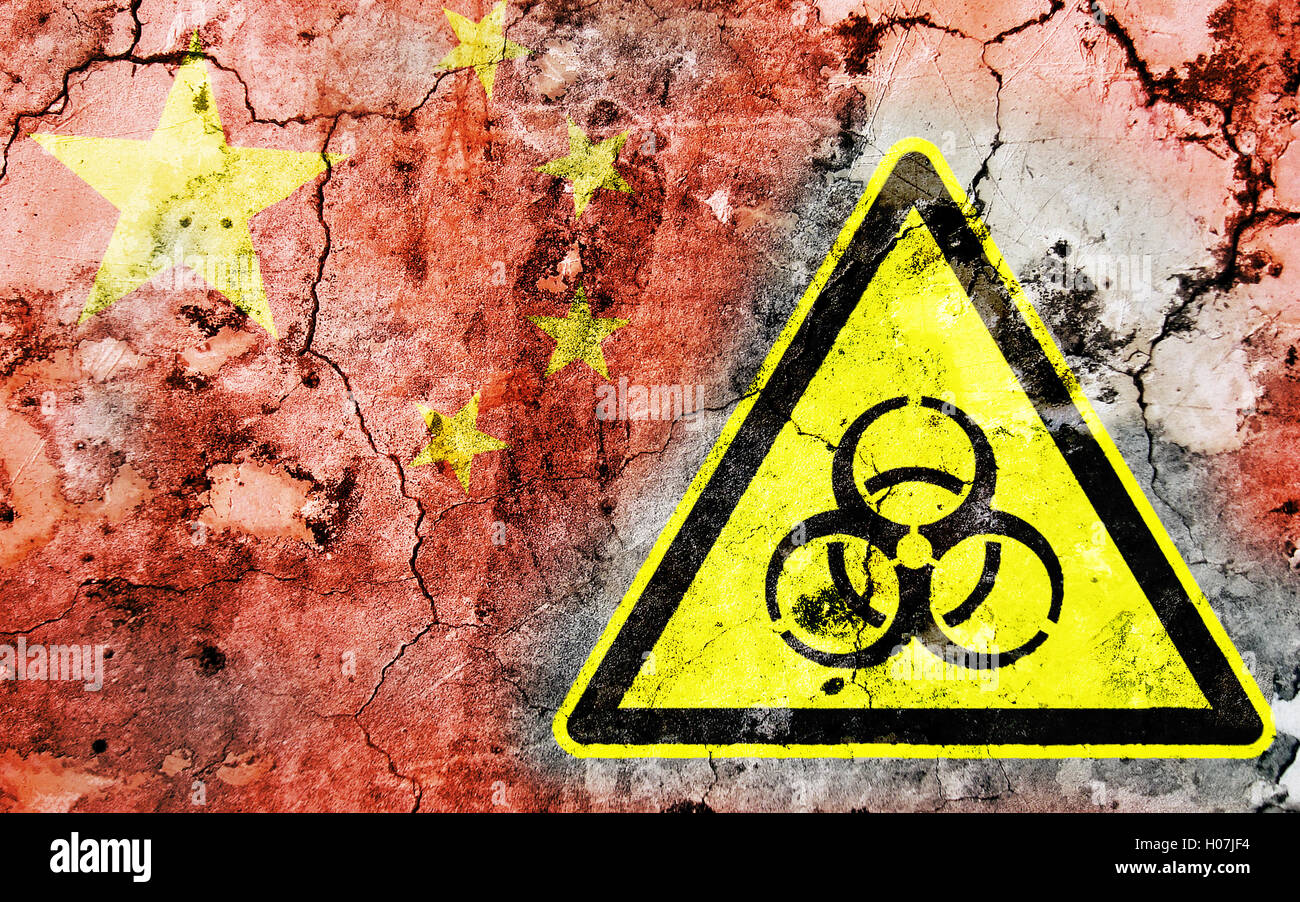 Old cracked wall with biohazard warning sign and painted flag Stock ...