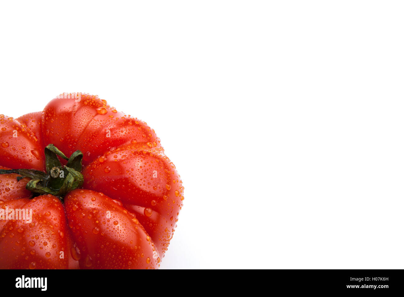 big red tomato close up Stock Photo - Alamy