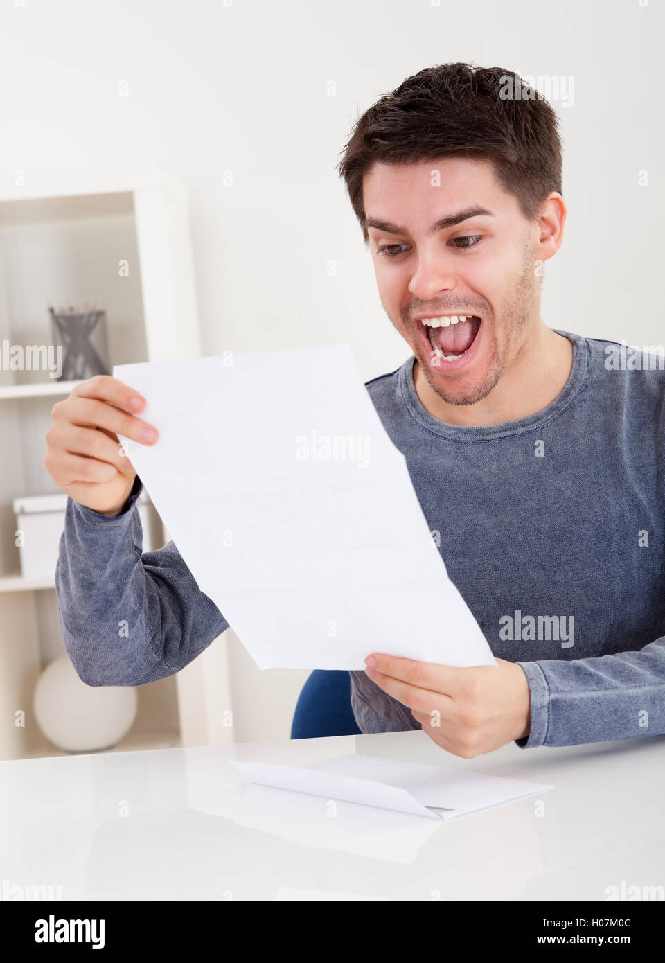 Happy laughing cheering hi-res stock photography and images - Alamy