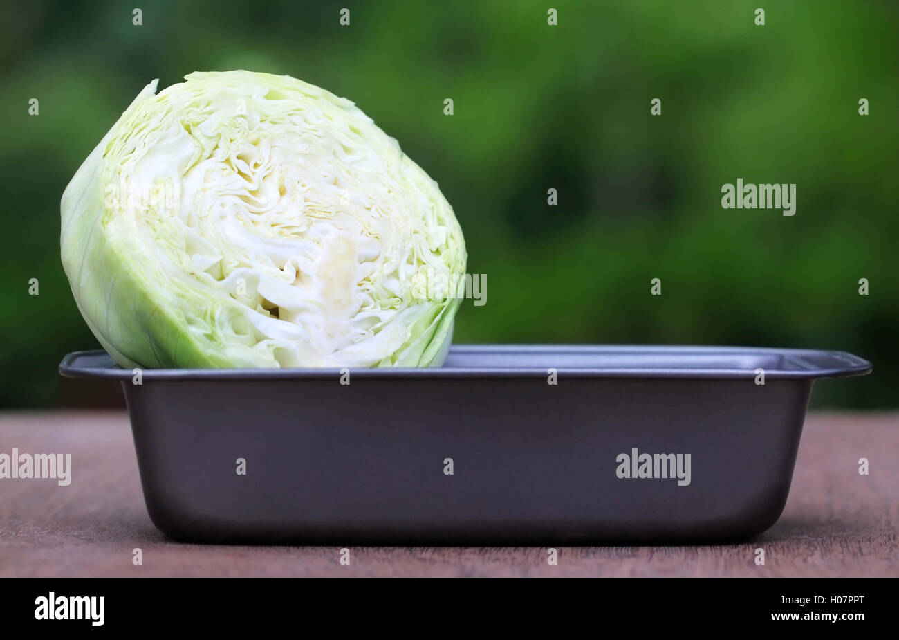 Cabbage on a metal container Stock Photo - Alamy